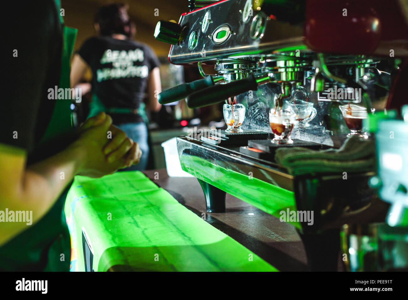 championship among coffee houses, members of teams show barista's skill ...