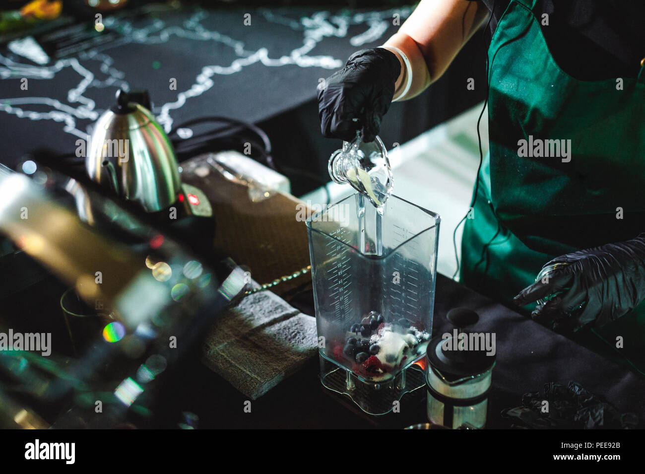 championship among coffee houses, members of teams show barista's skill ...