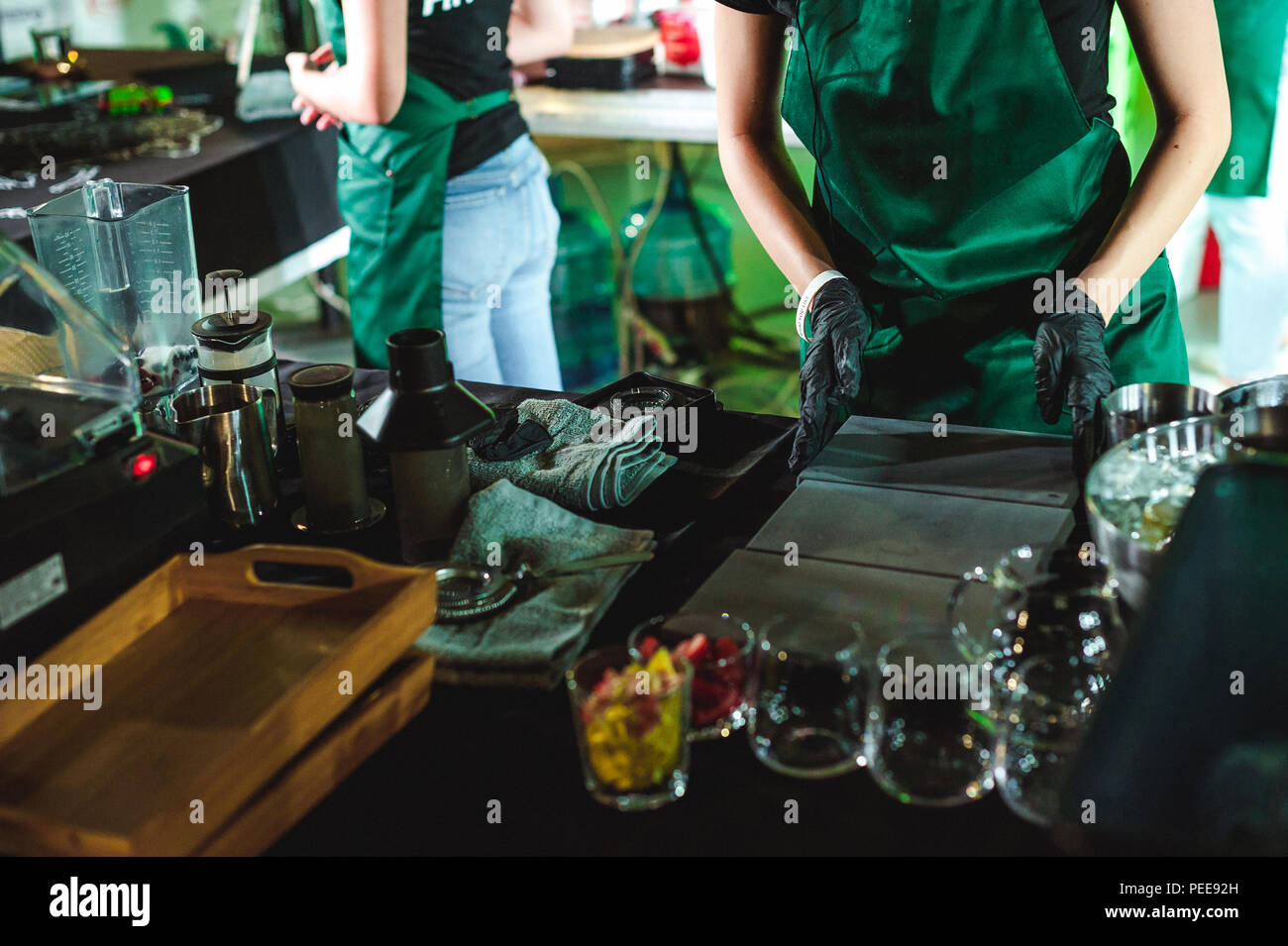 championship among coffee houses, members of teams show barista's skill ...