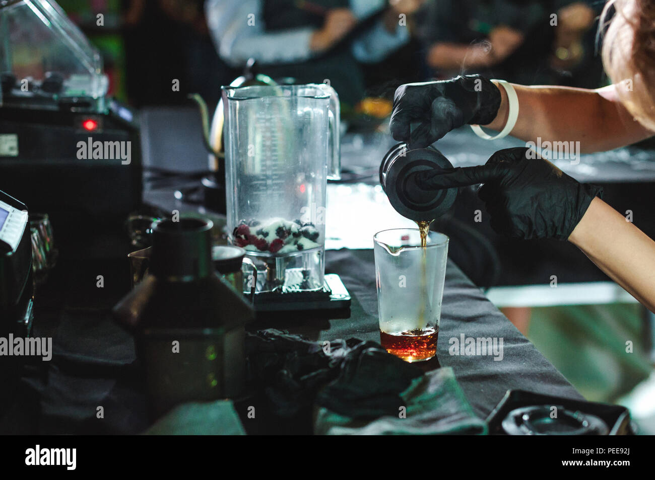 championship among coffee houses, members of teams show barista's skill ...