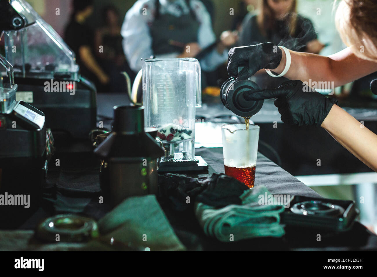 championship among coffee houses, members of teams show barista's skill ...
