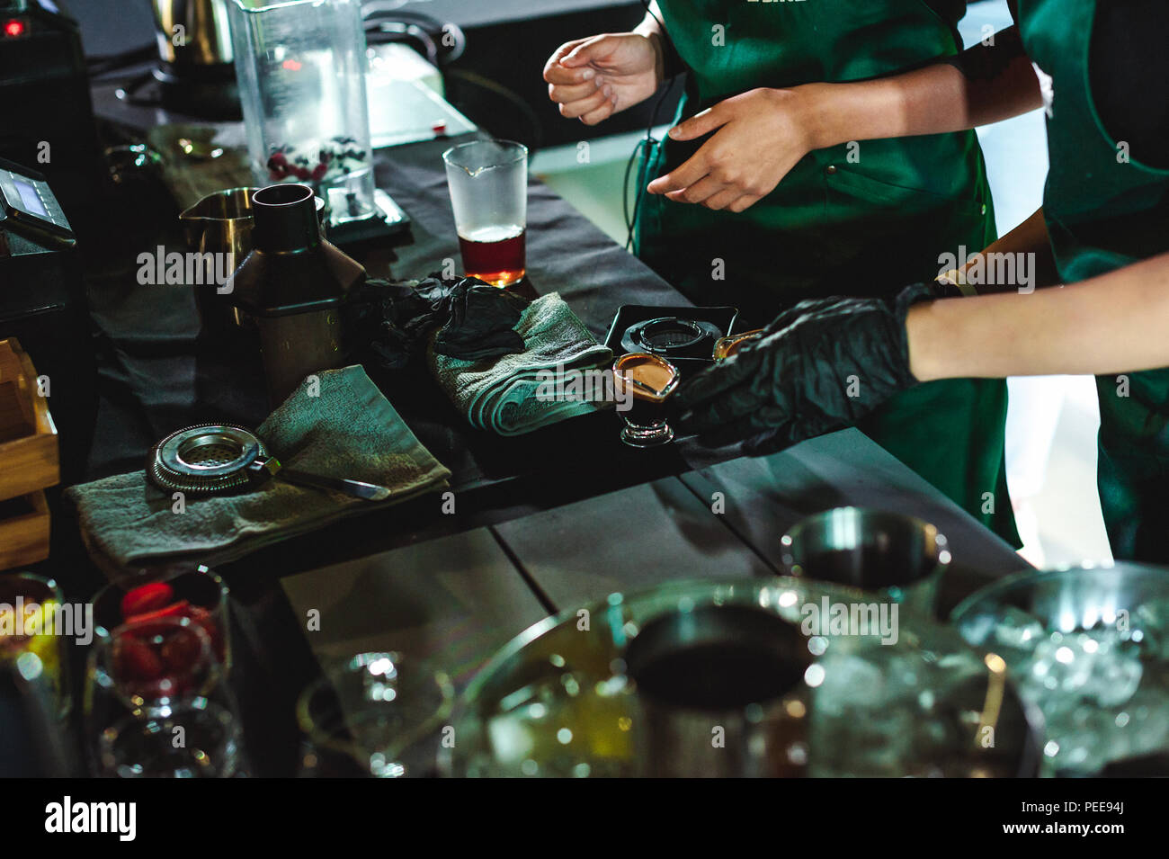 championship among coffee houses, members of teams show barista's skill ...