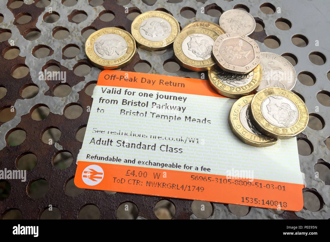 Off-peak day return rail tickets and money Stock Photo - Alamy
