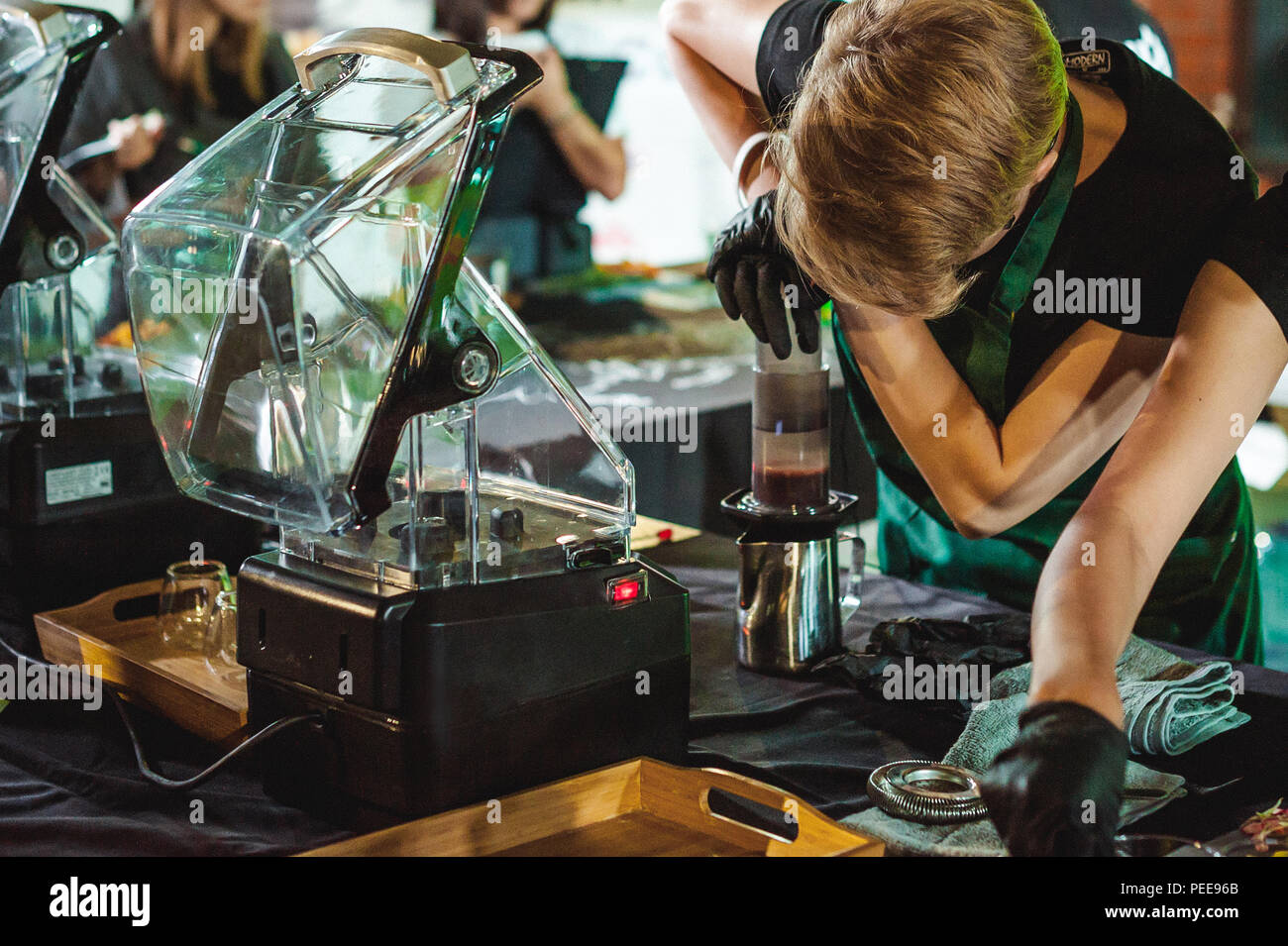 championship among coffee houses, members of teams show barista's skill ...