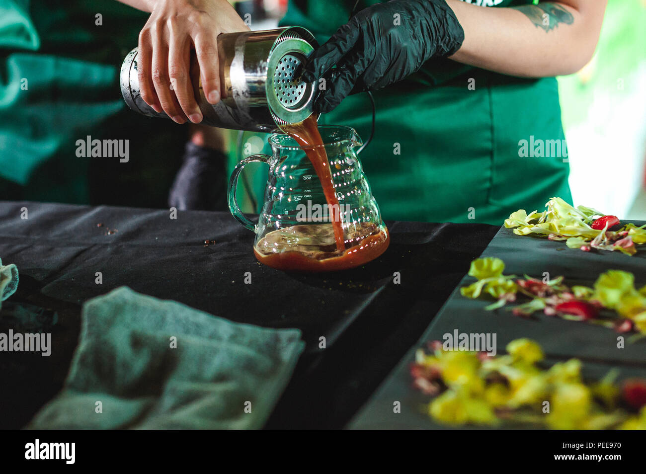 championship among coffee houses, members of teams show barista's skill ...