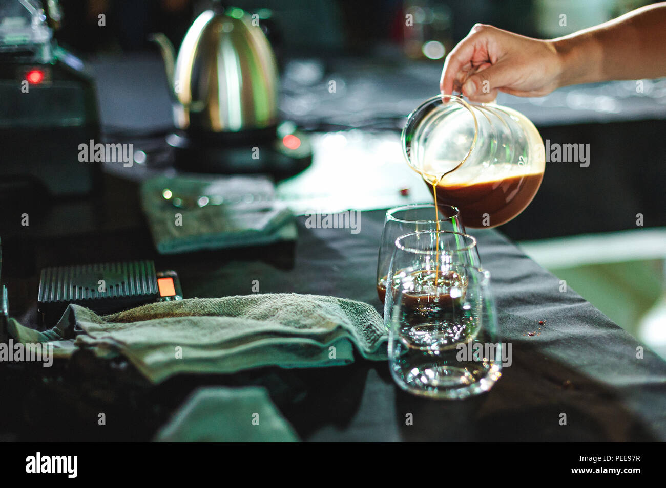 championship among coffee houses, members of teams show barista's skill ...