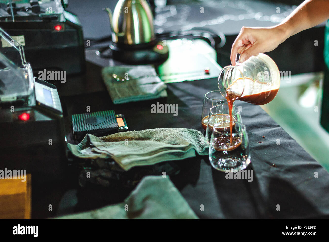 championship among coffee houses, members of teams show barista's skill ...