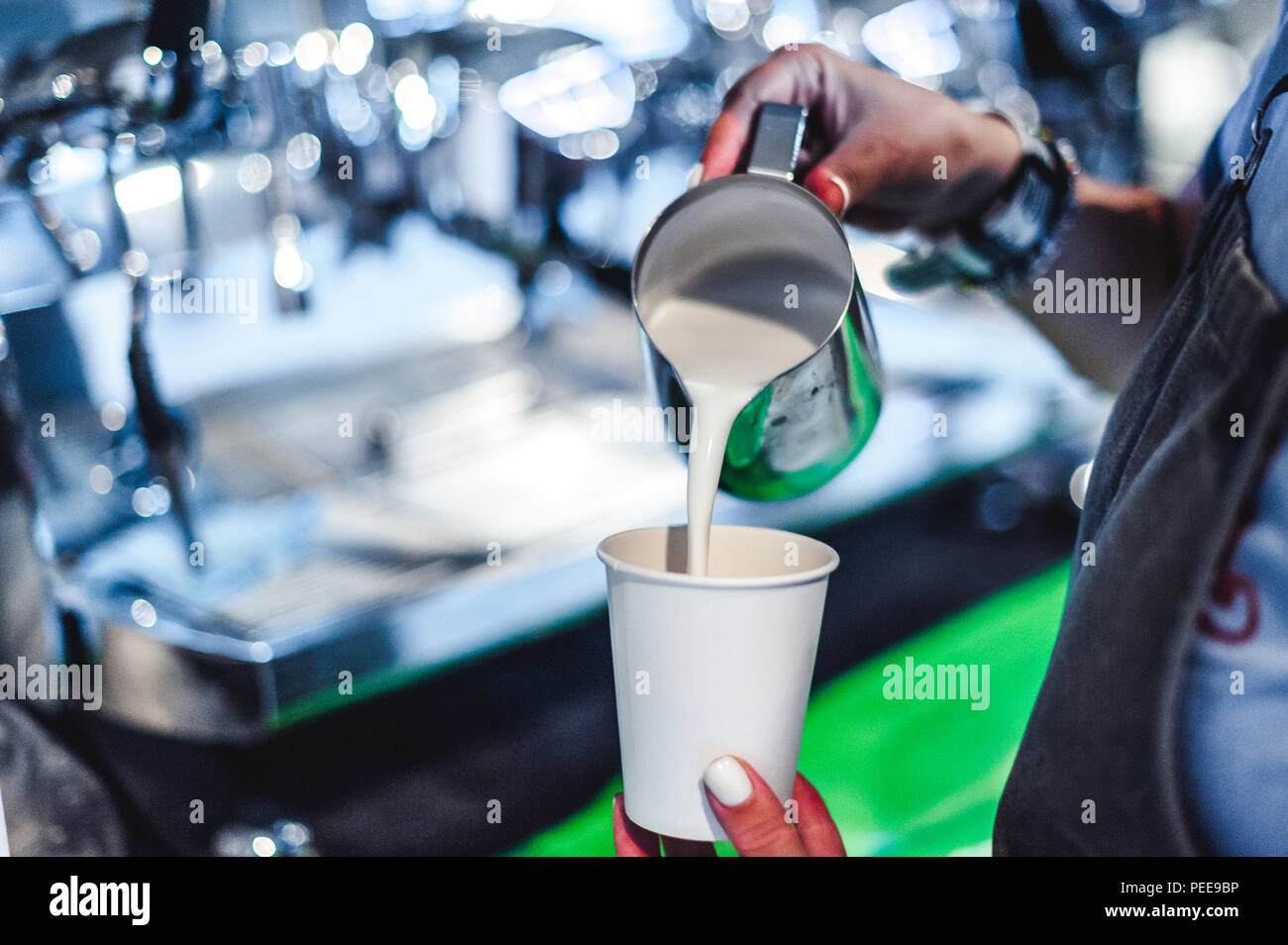 championship among coffee houses, members of teams show barista's skill ...