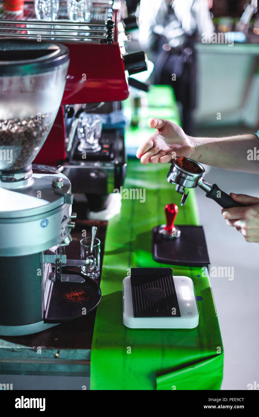 championship among coffee houses, members of teams show barista's skill ...