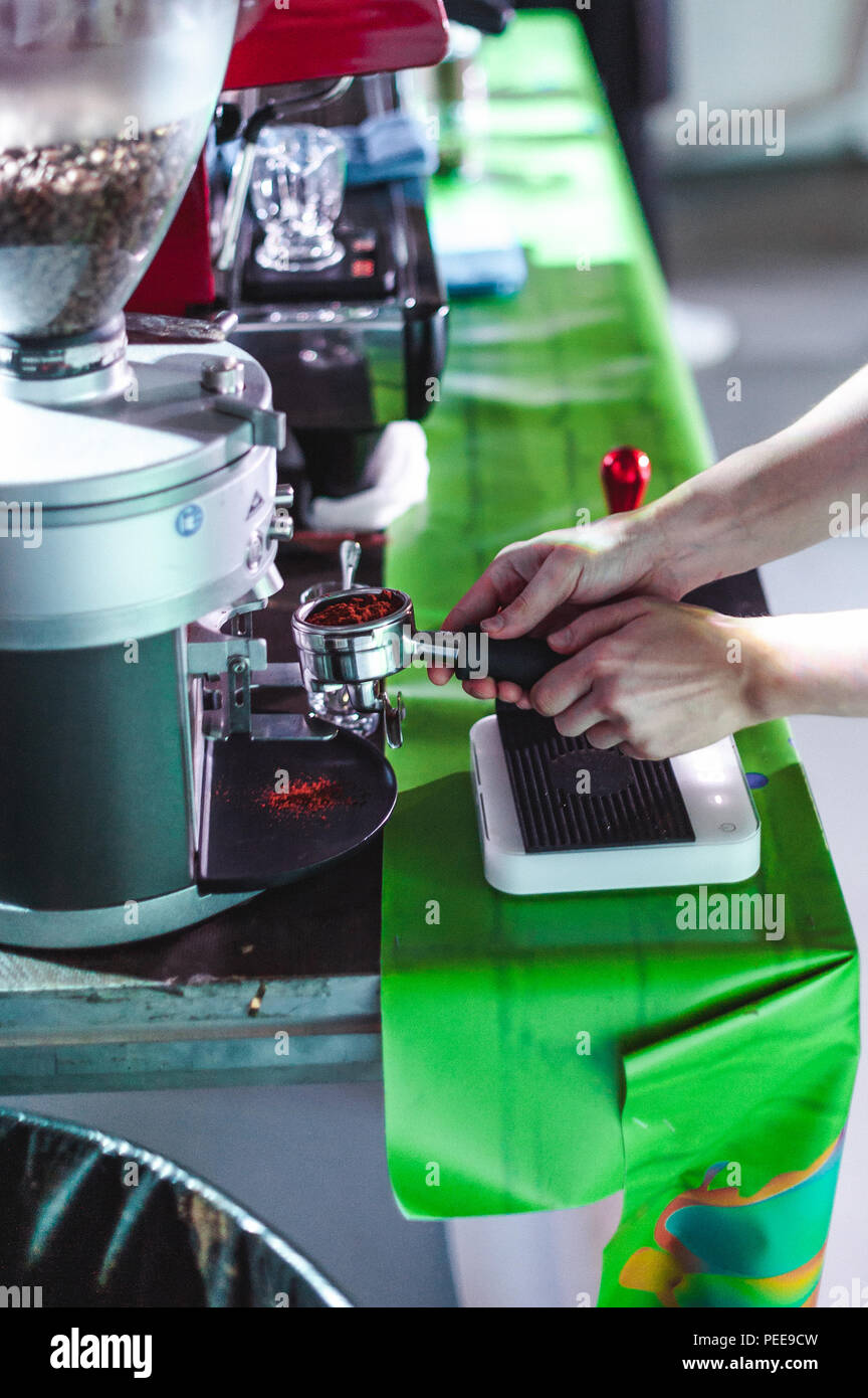 championship among coffee houses, members of teams show barista's skill ...