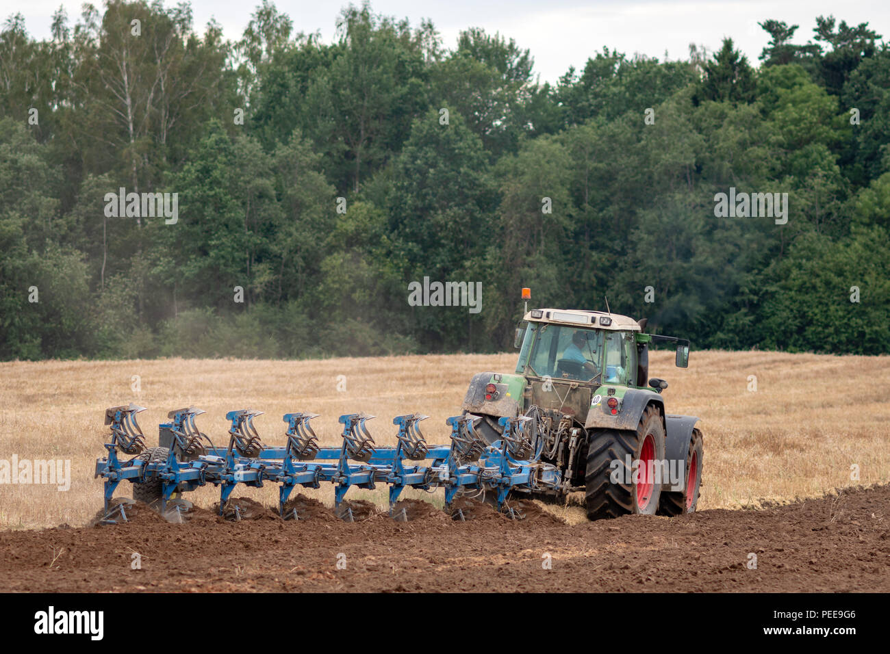 Back view farm tractor plough hi-res stock photography and images - Alamy