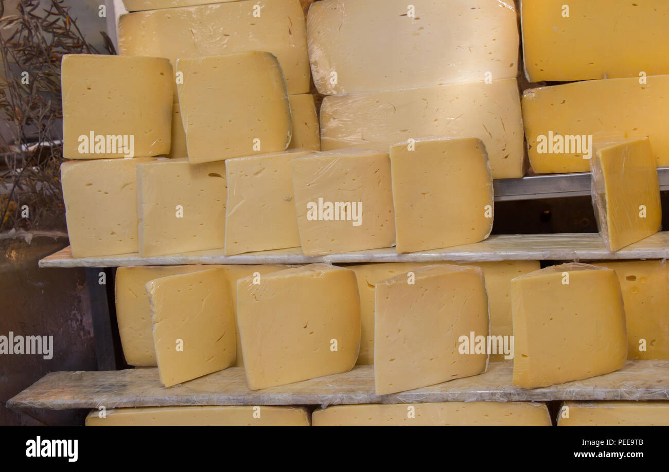 cuts of kashkaval or kasseri cheese for sale on the shelf Stock Photo ...
