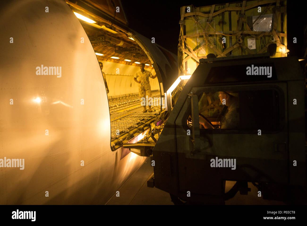 U.S. Marine Corps Cpl. Shawn A. Porter, right, a heavy equipment ...