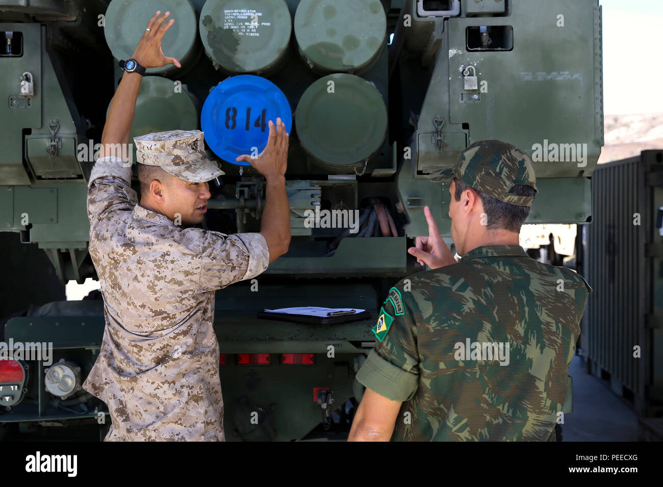 Master Sgt. Alex Ng, the field artillery chief assigned to Battery Q ...