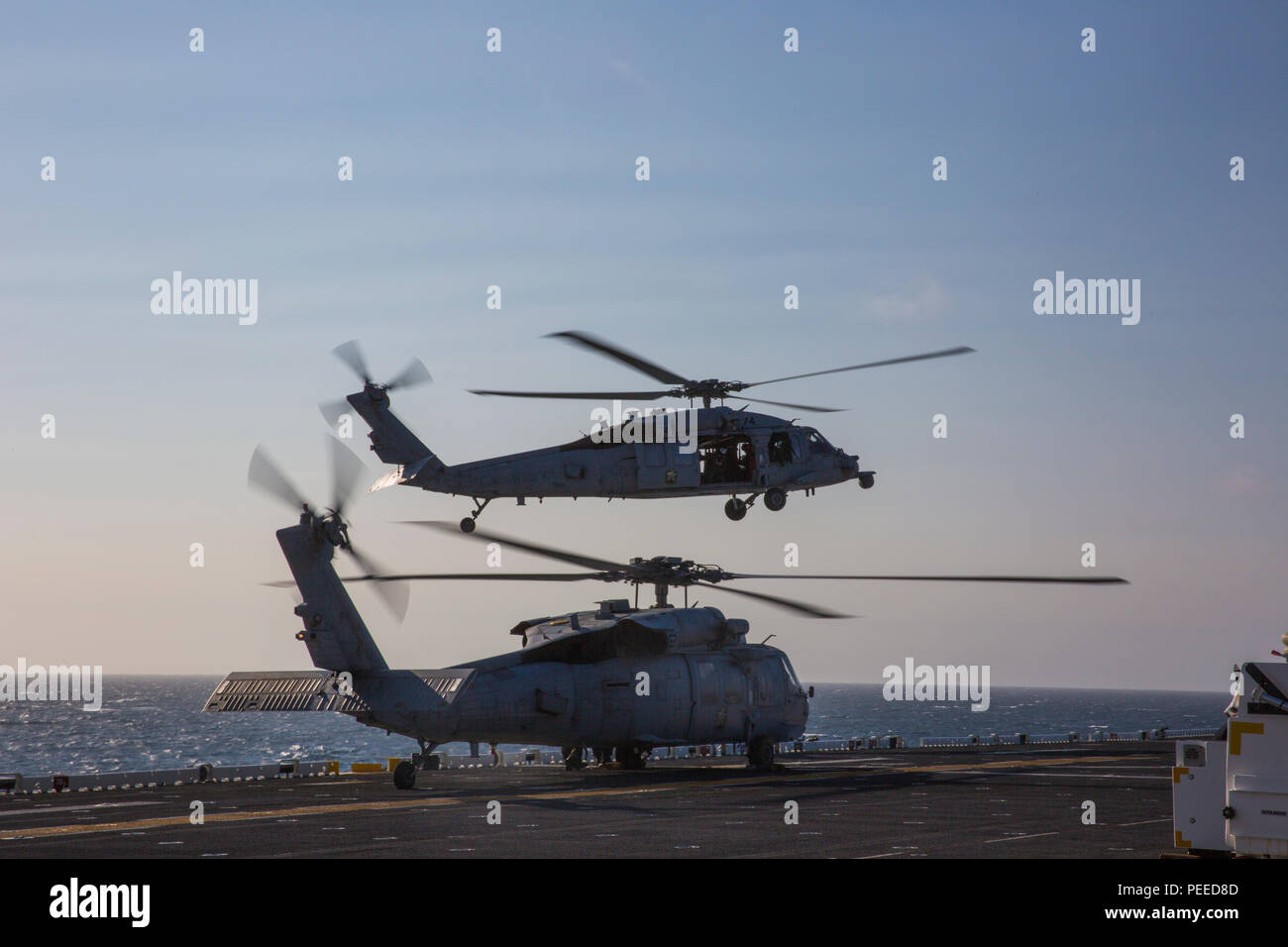 Two MH-60S Seahawks with Helicopter Sea Combat Squadron (HSC) 21 take ...