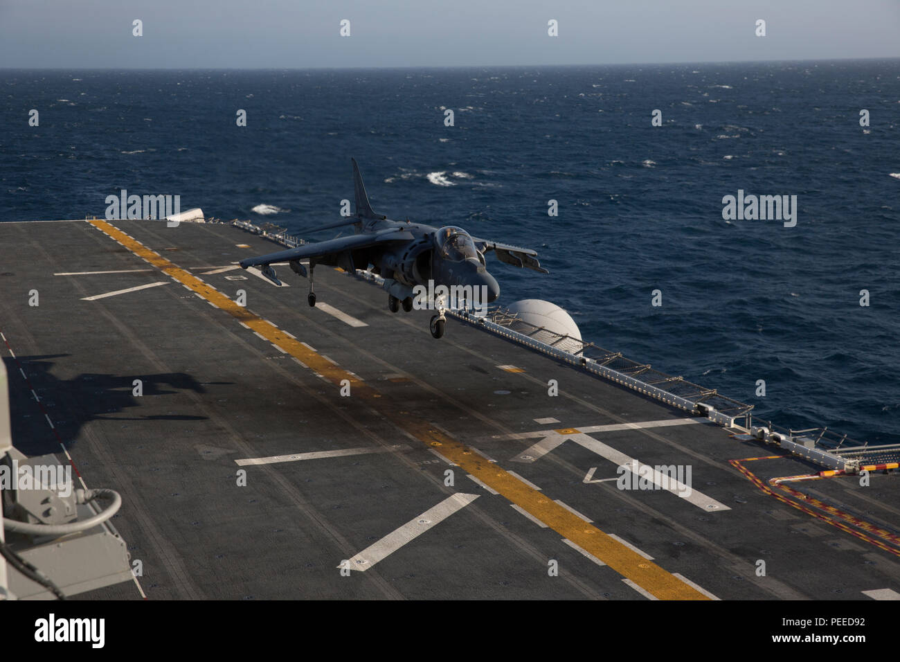An AV-8B Harrier with Marine Attack Squadron (VMA) 214 conducts a ...