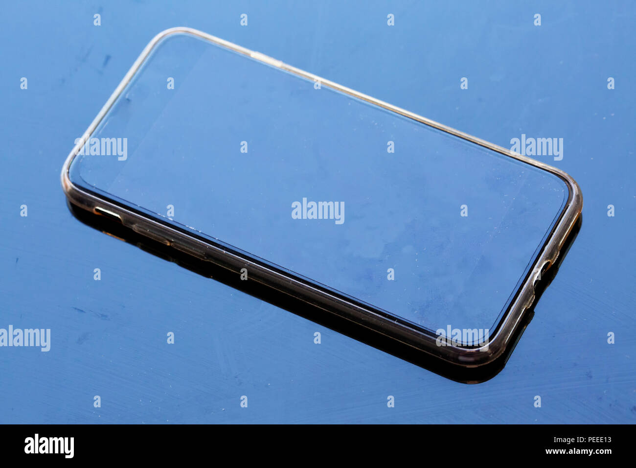 Smartphone over a black background, horizontal image Stock Photo - Alamy