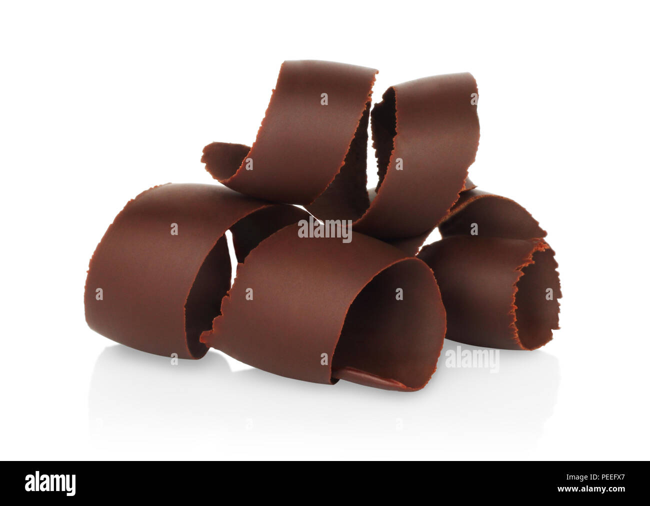 Chocolate shavings on white background close-up Stock Photo - Alamy