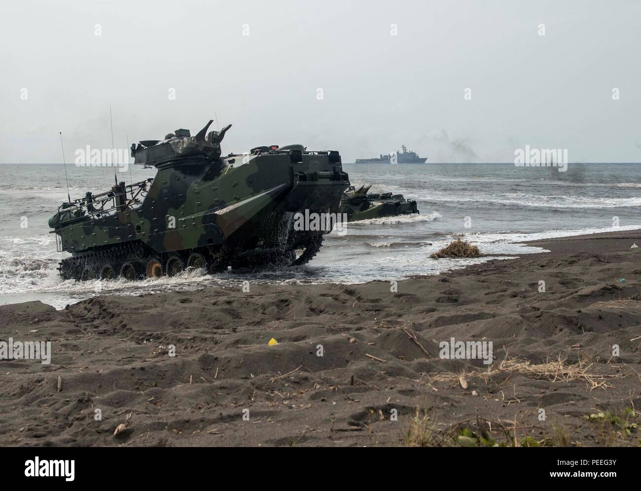 150807-N-SU278-356 JAVA SEA, Indonesia (Aug. 7, 2015) A wave of ...