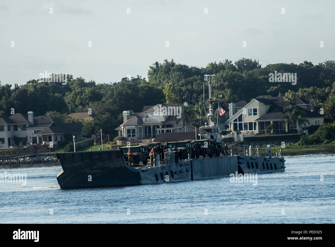 An Improved Navy Lighterage System loaded with vehicles from a recent ...