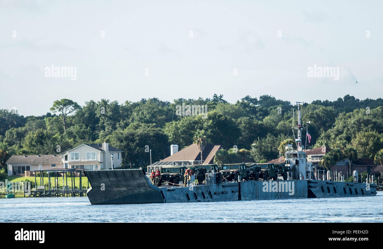An Improved Navy Lighterage System loaded with vehicles from a recent ...
