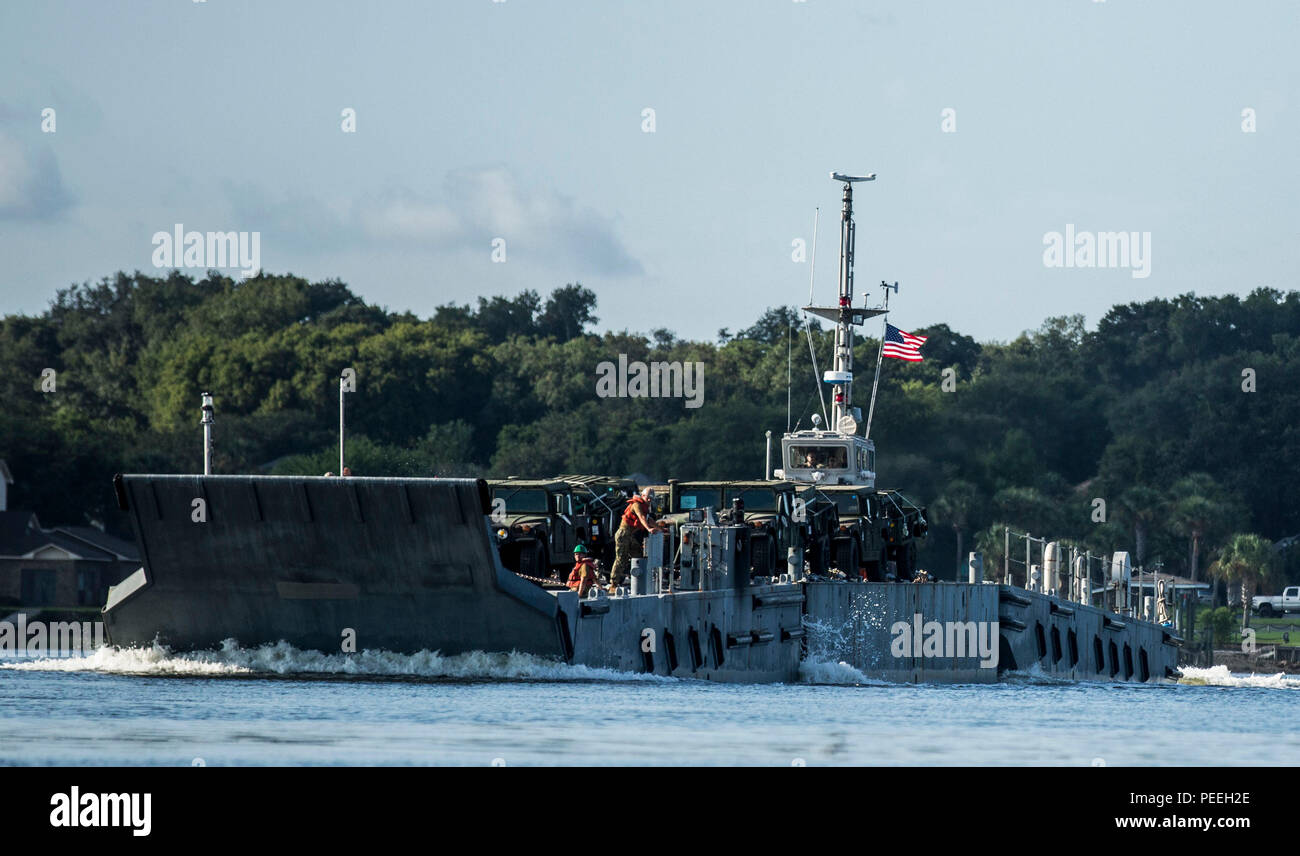 An Improved Navy Lighterage System loaded with vehicles from a recent ...