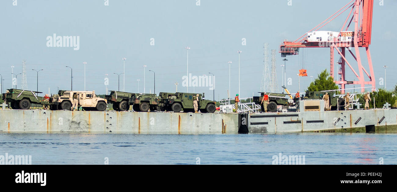 Marines with Combat Logistics Regiment 25 inspect vehicles on an ...