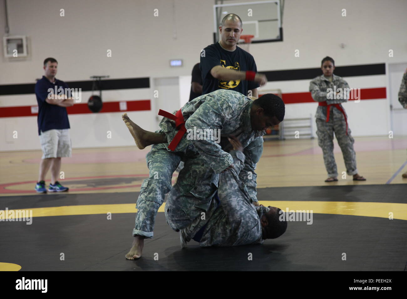 Army Staff Sgt. Brad Wilkerson (red belt), of the European Missile ...