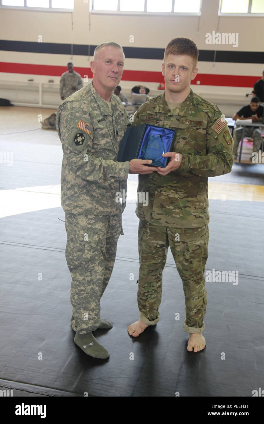 Army Sgt. Maj. James Murrin (left), the senior enlisted leader of the ...