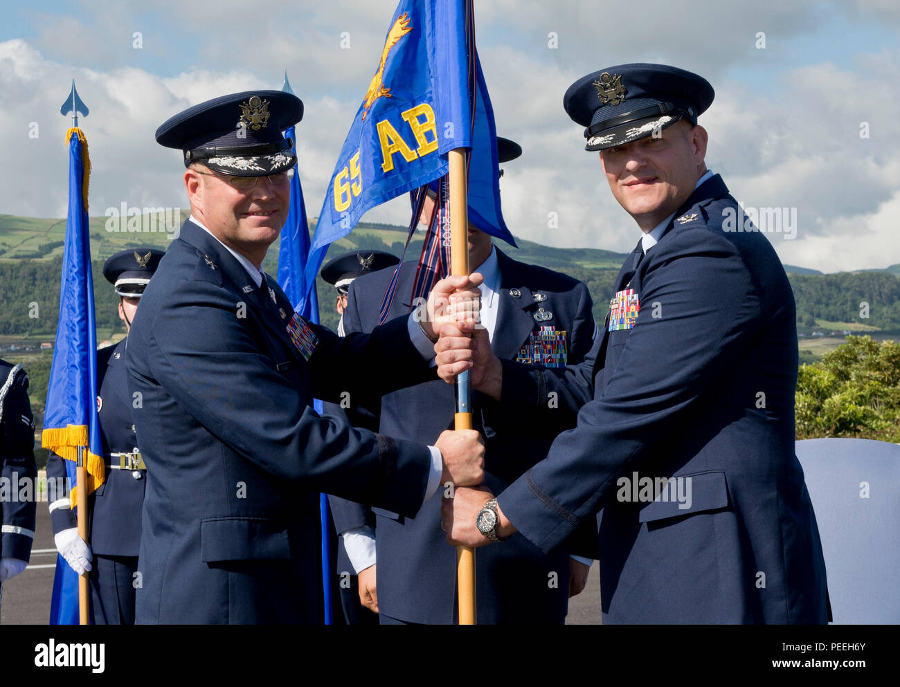 Col. Richard Sheffe, commander of the 65th Air Base Group, receives the ...