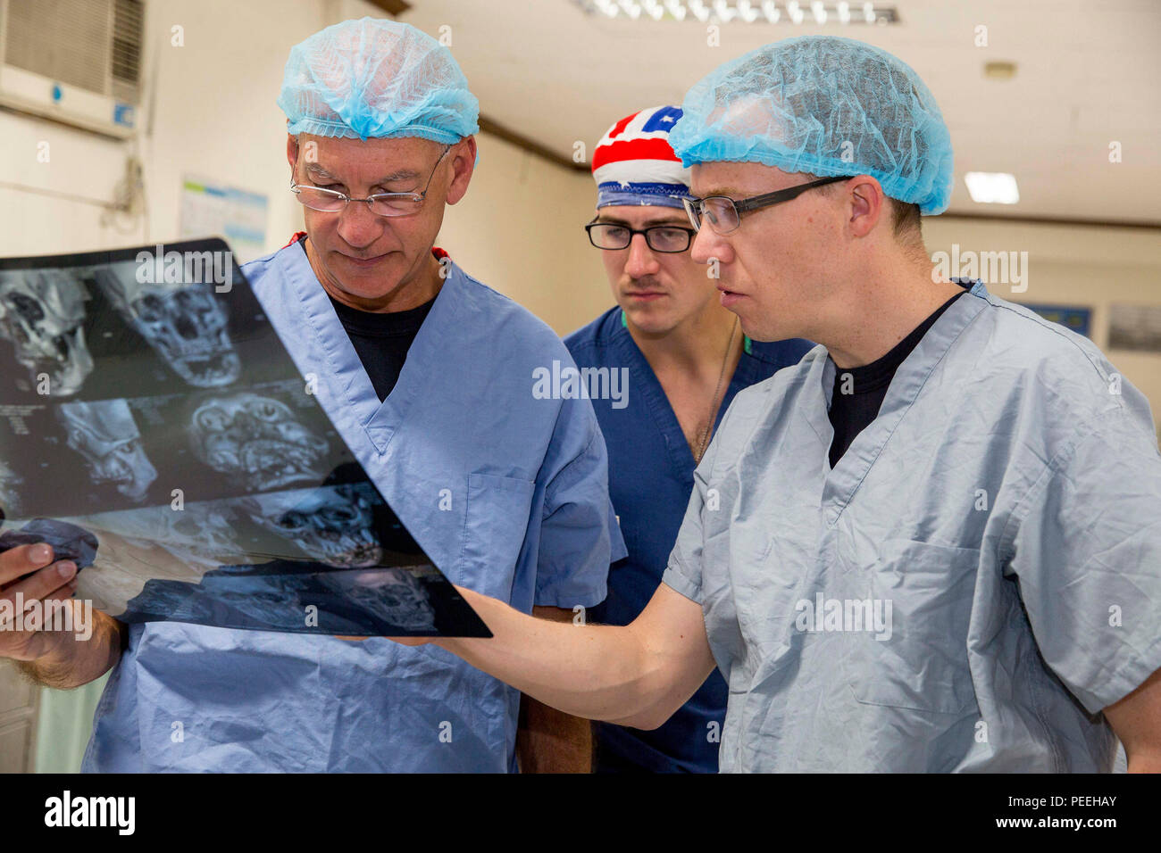 QUEZON CITY, Philippines (Aug. 11, 2015) Capt. Kevin Flynn (left) from ...