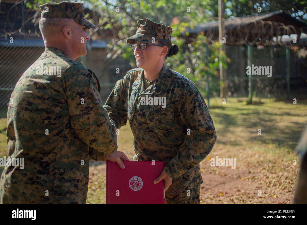 U.S. Marine Corps Lt. Col. David Hudak, left, commanding officer ...