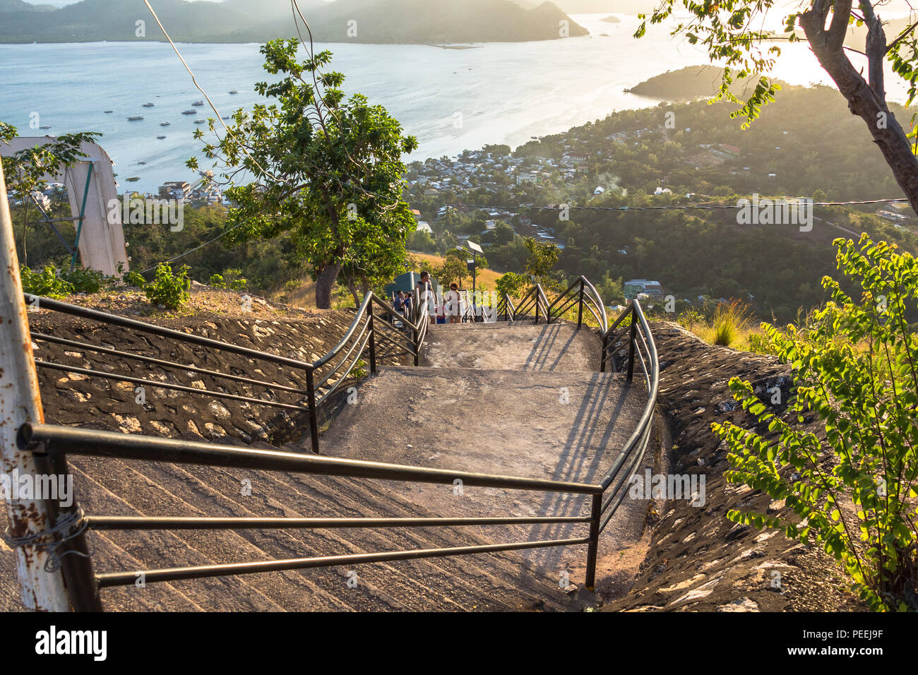 Steep stairs downhill with view over Coron Stock Photo - Alamy