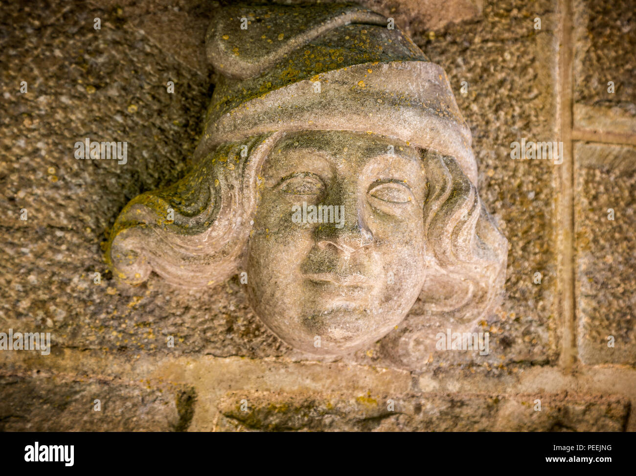 Carved stone head on wall hi-res stock photography and images - Alamy