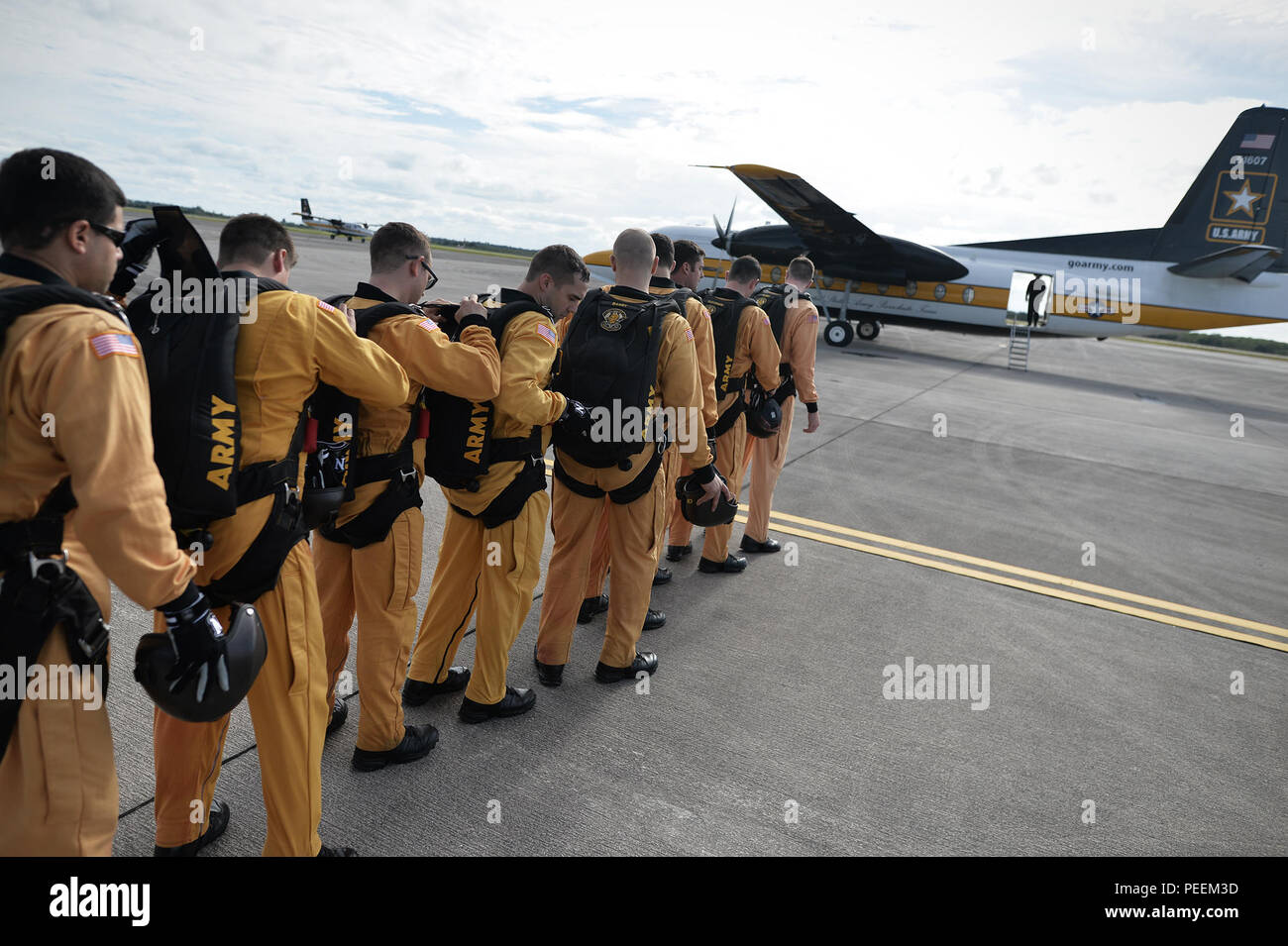 Members of the U.S. Army's Golden Knights demonstration team check each ...