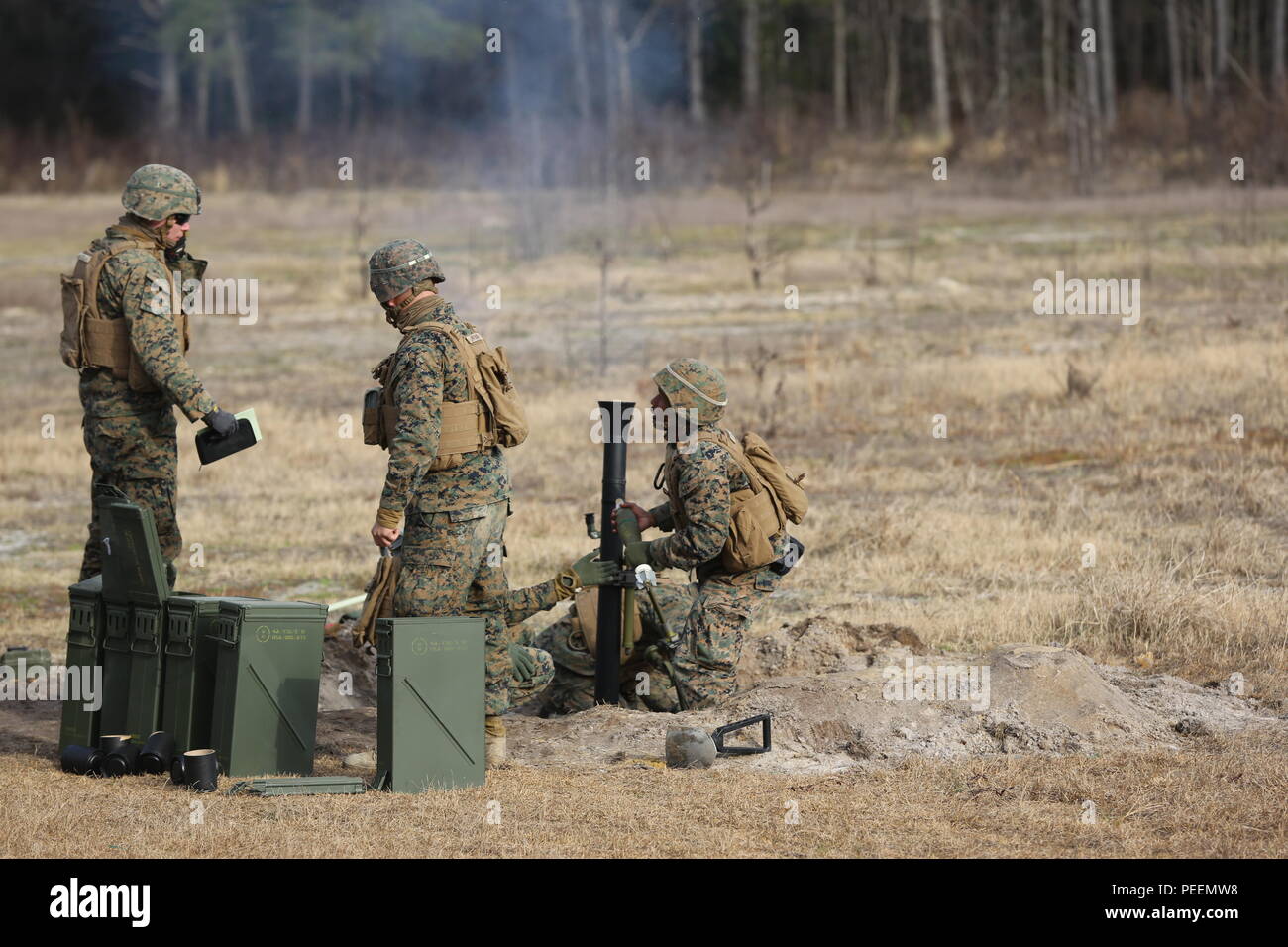 Marines with 2nd Battalion, 2nd Marine Regiment, launch a round during ...