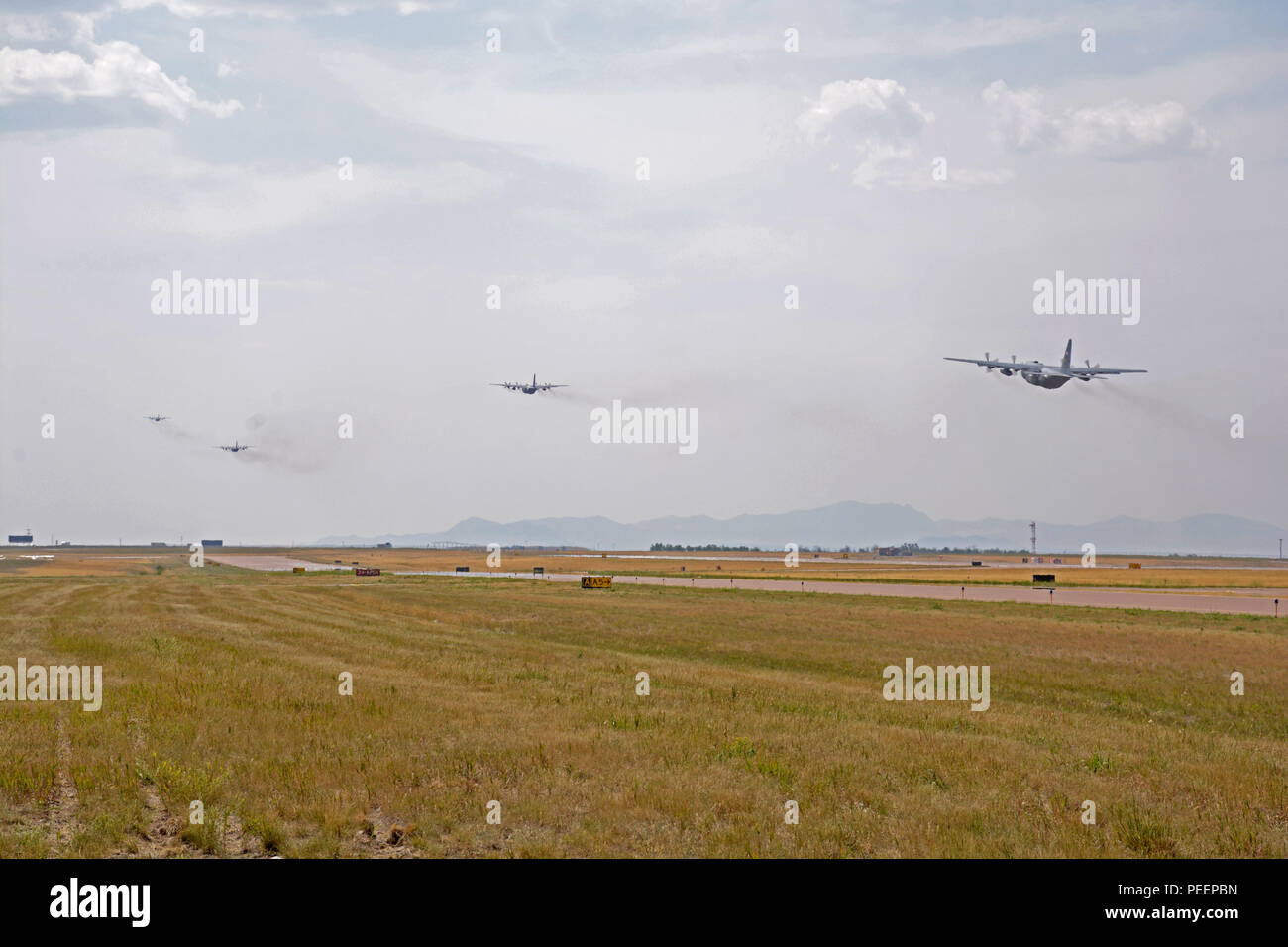 Four C-130 Hercules transport aircraft assigned to the 120th Airlift ...