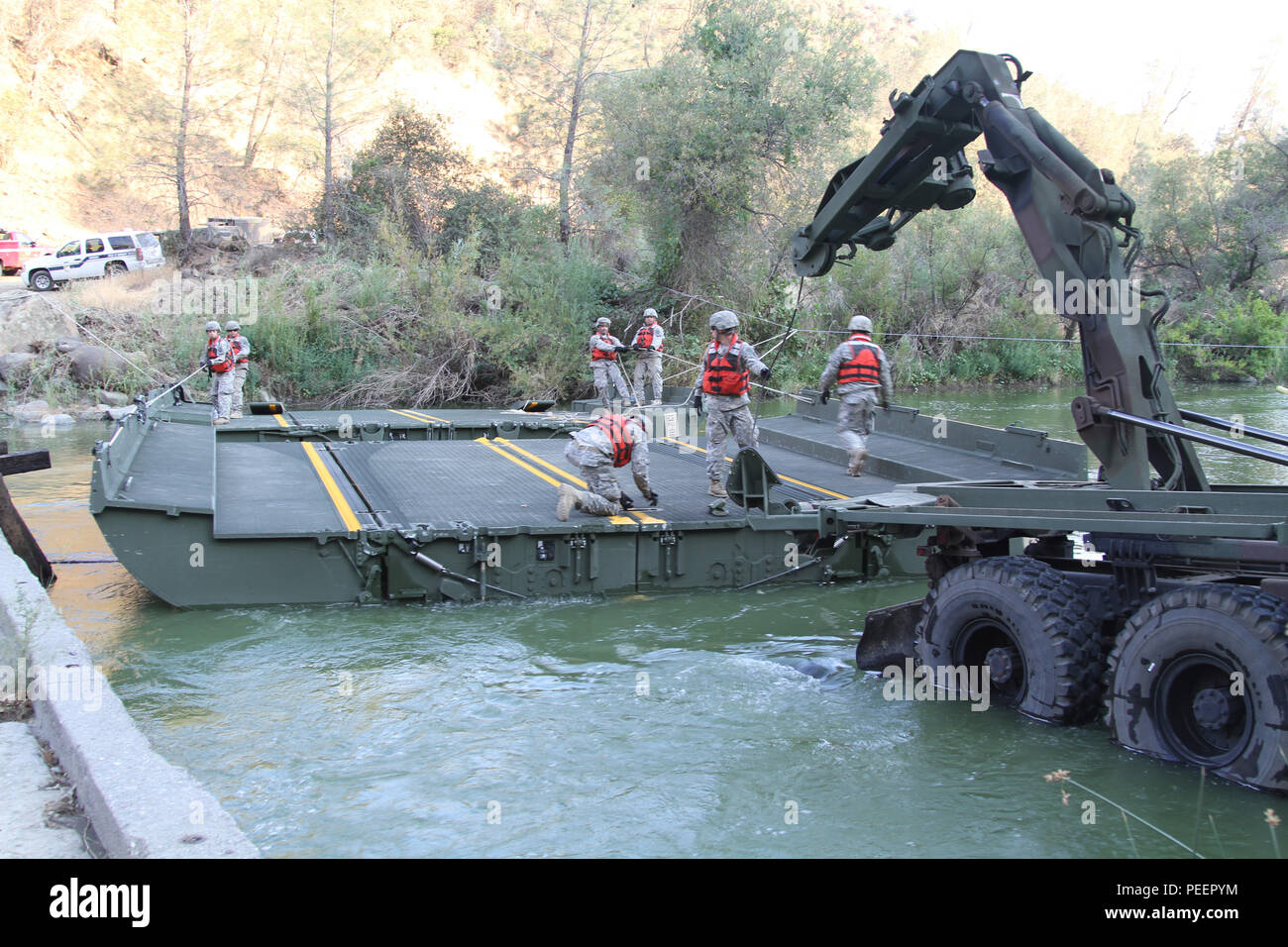 Members of the 132nd Multirole Bridge Company (MRBC), California Army ...