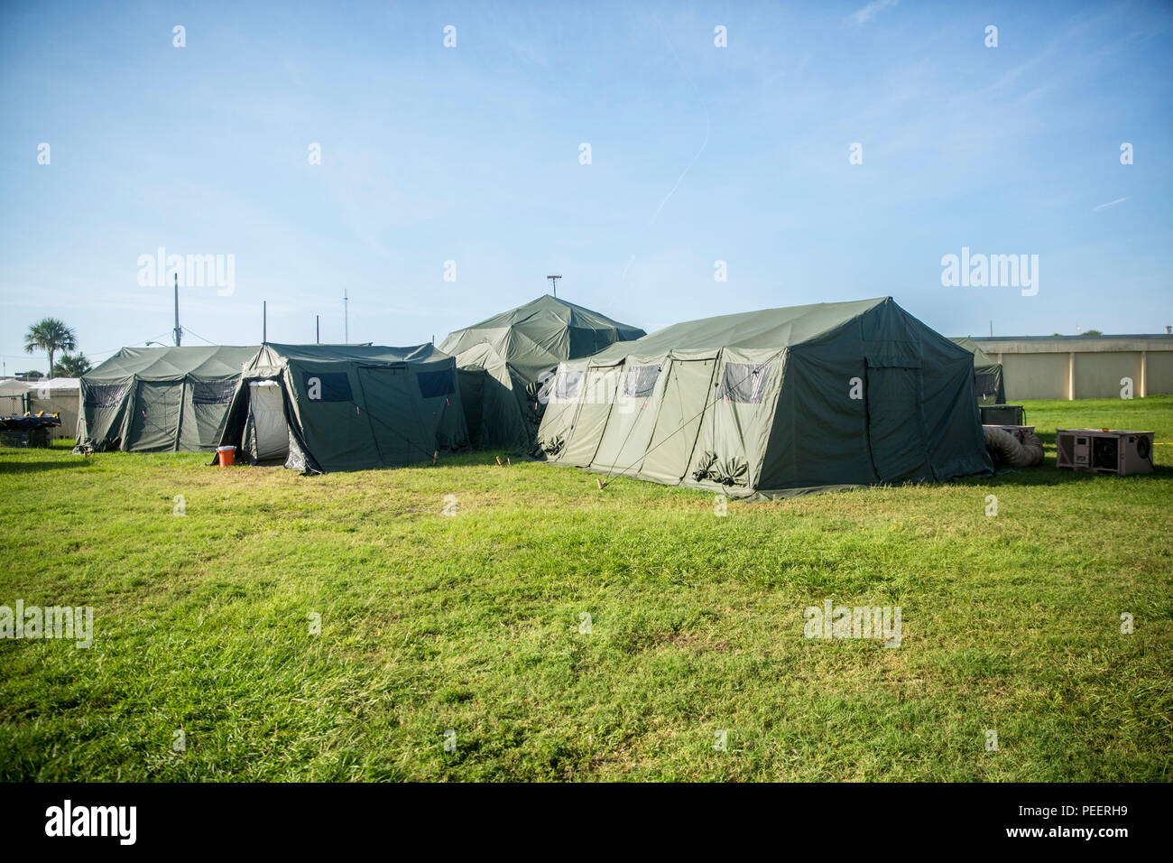 A Navy Tactical Operations Center rests in a field aboard Naval Station ...
