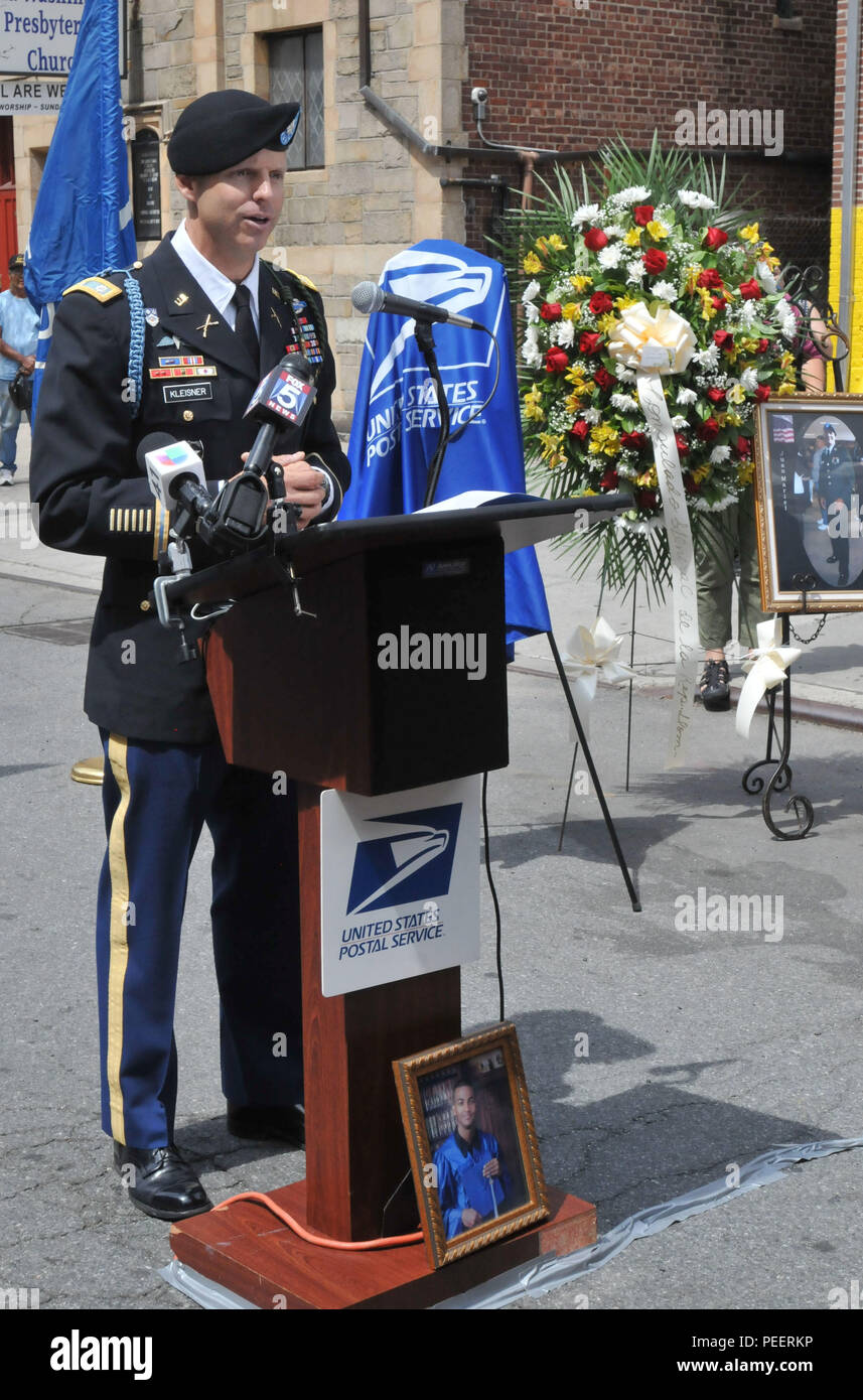 Lt. Col. Teddy Kleisner speaks to attendees of a post office ...