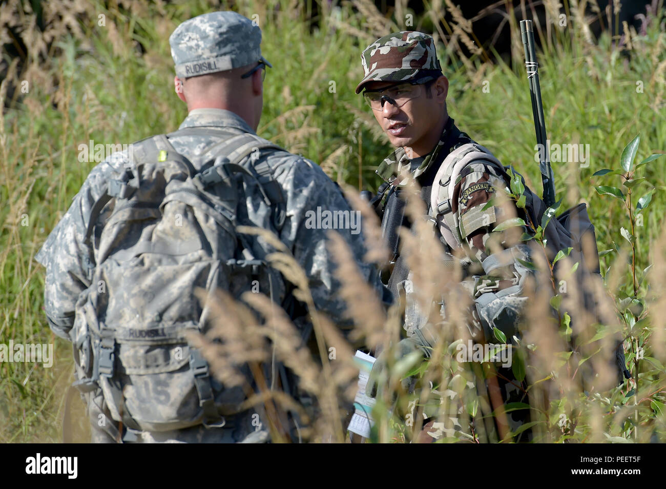 A Nepalese Army Ranger works with U.S. Army Soldiers during the ...