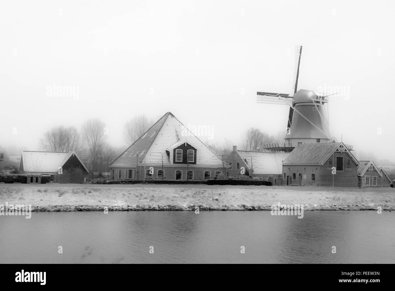 Old village windmill in Black and White Stock Photos & Images - Alamy