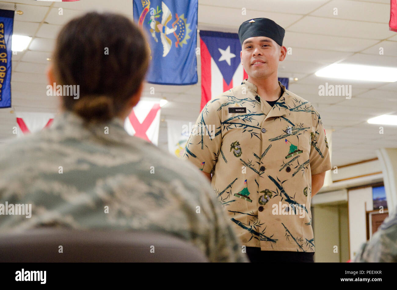 Lance Cpl. Hector Munguia (right), a food service specialist with ...