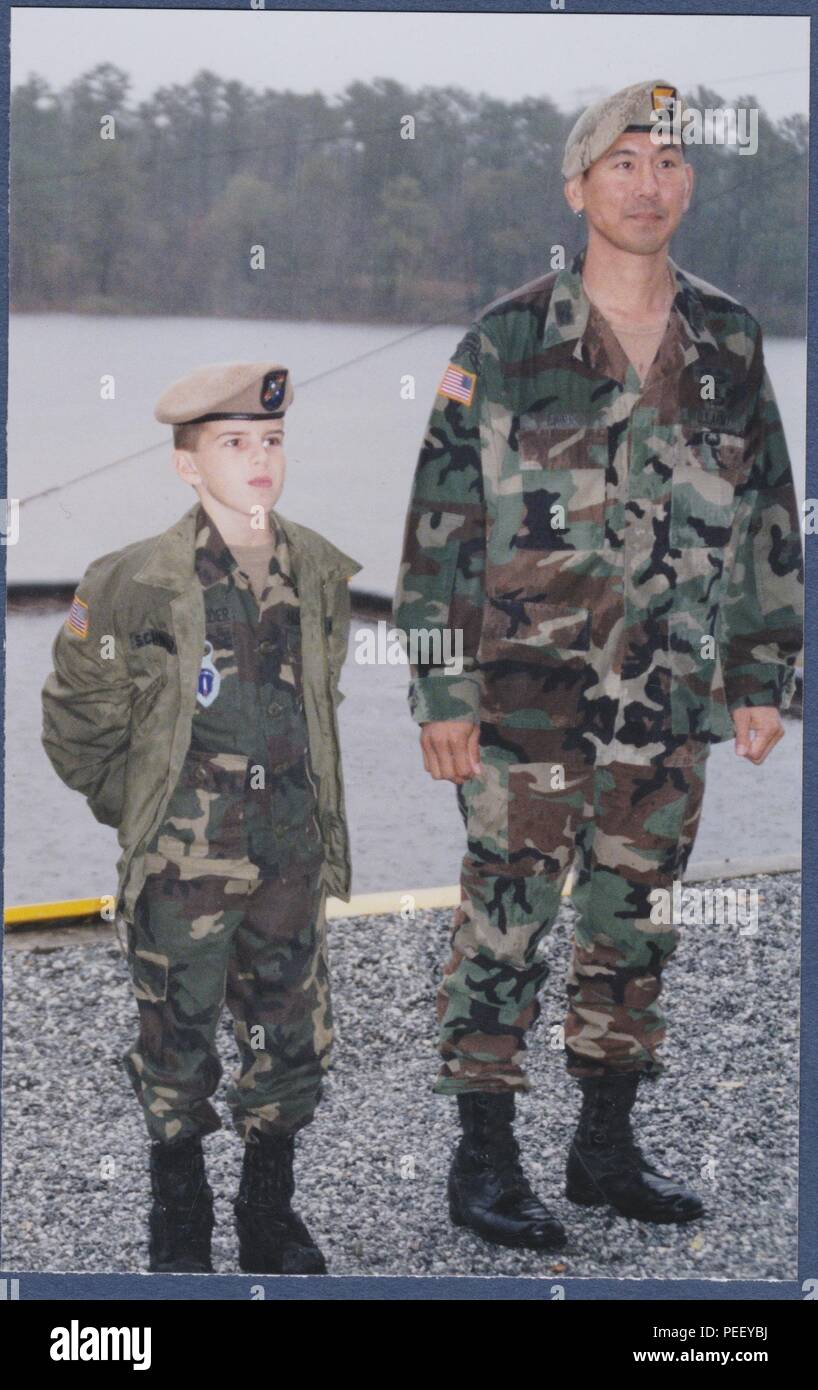 Evan Schneider, a Make-A-Wish Foundation recipient, stands with then ...