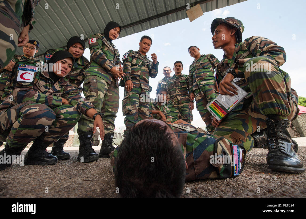 Malaysian army soldiers practice first responder medical training with ...