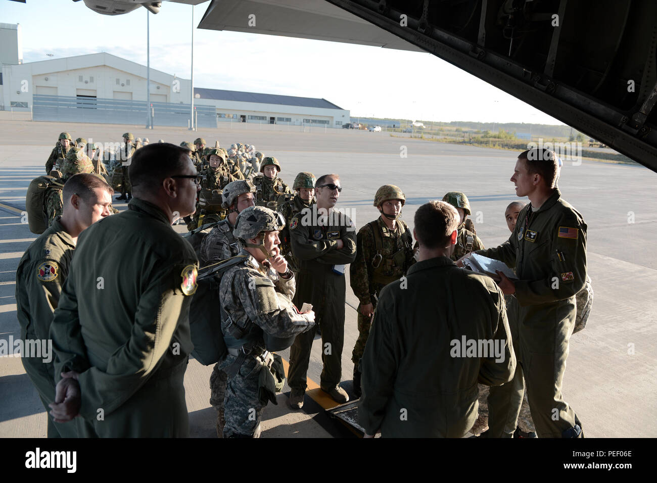 Aircrew with the 36th Airlift Squadron brief Soldiers with the 1st ...