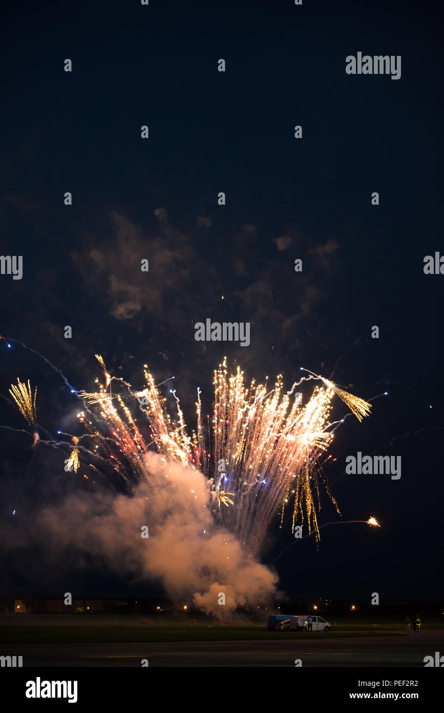 Multiple golden fireworks Stock Photo - Alamy