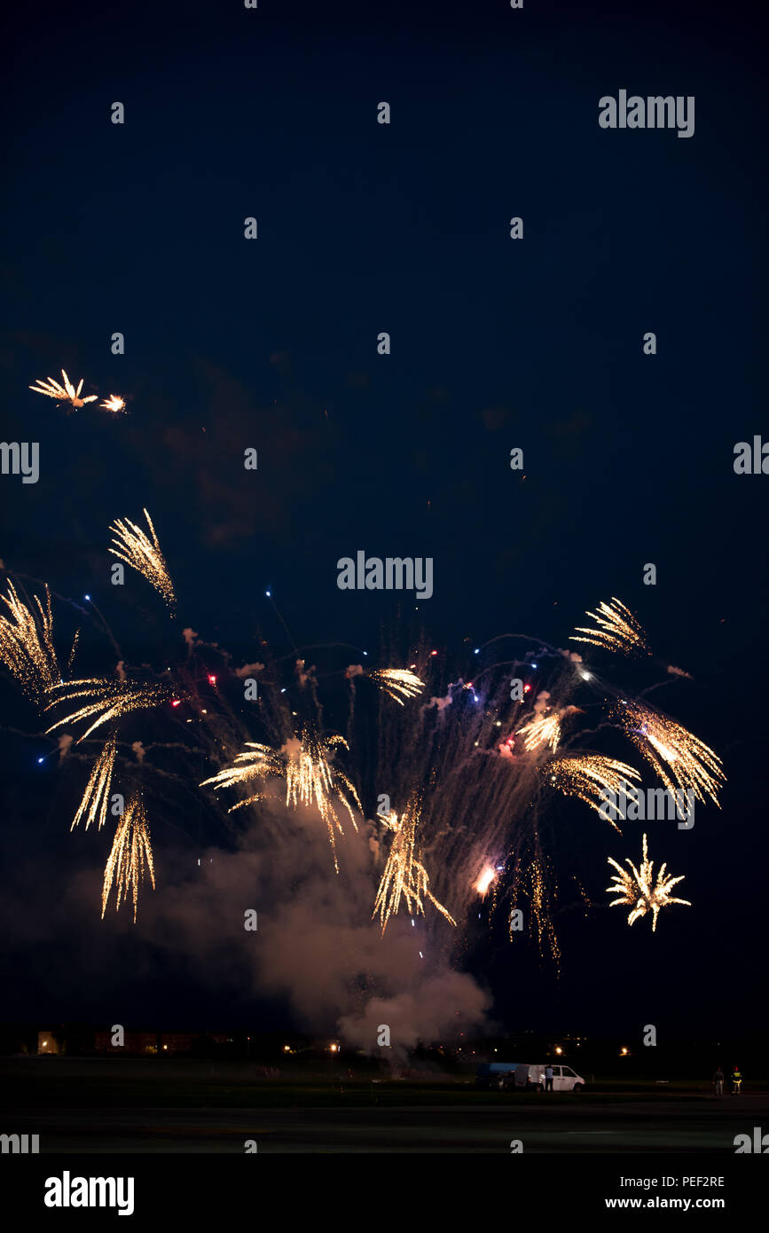 Multiple golden fireworks Stock Photo - Alamy