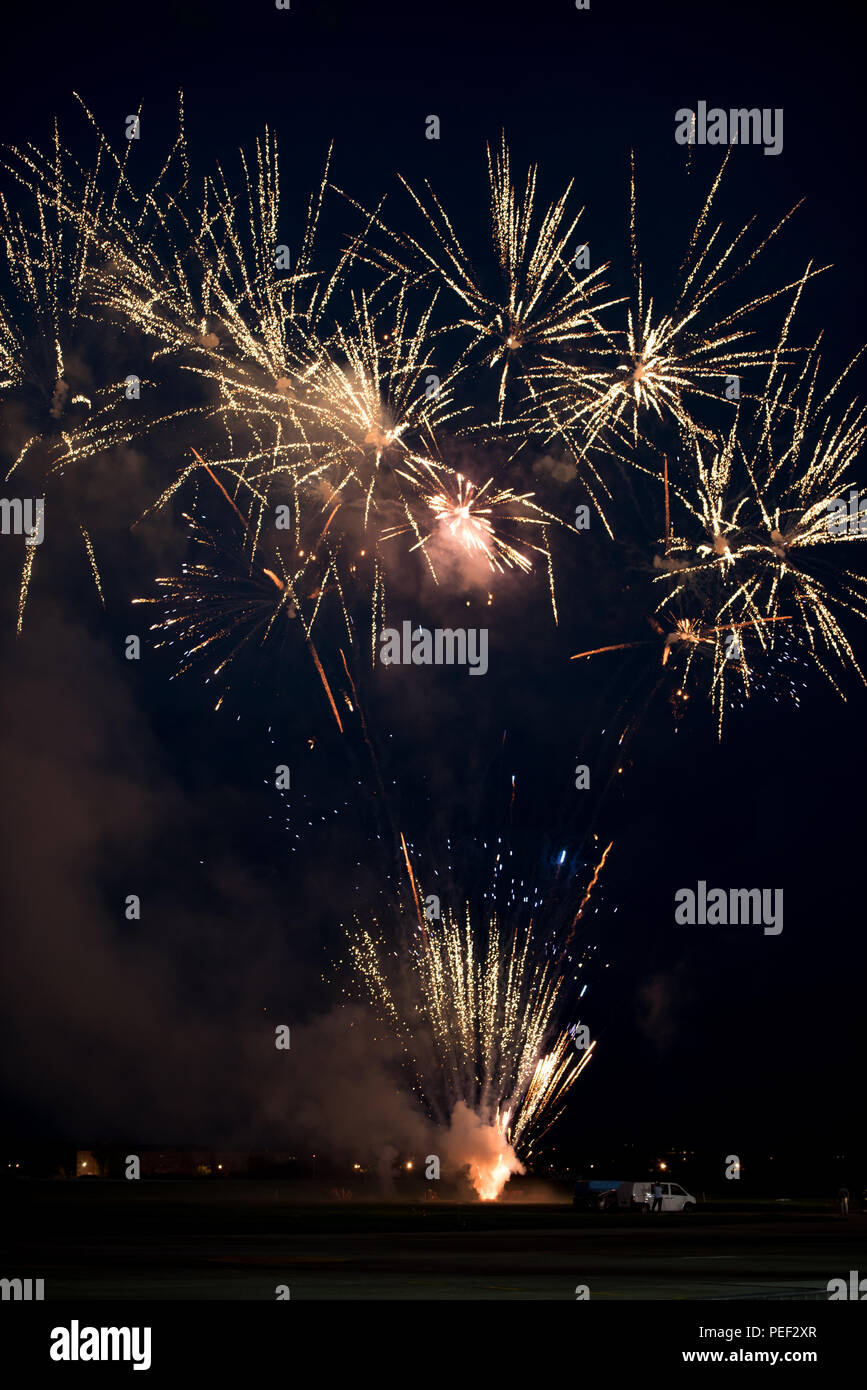 Multiple golden fireworks Stock Photo - Alamy