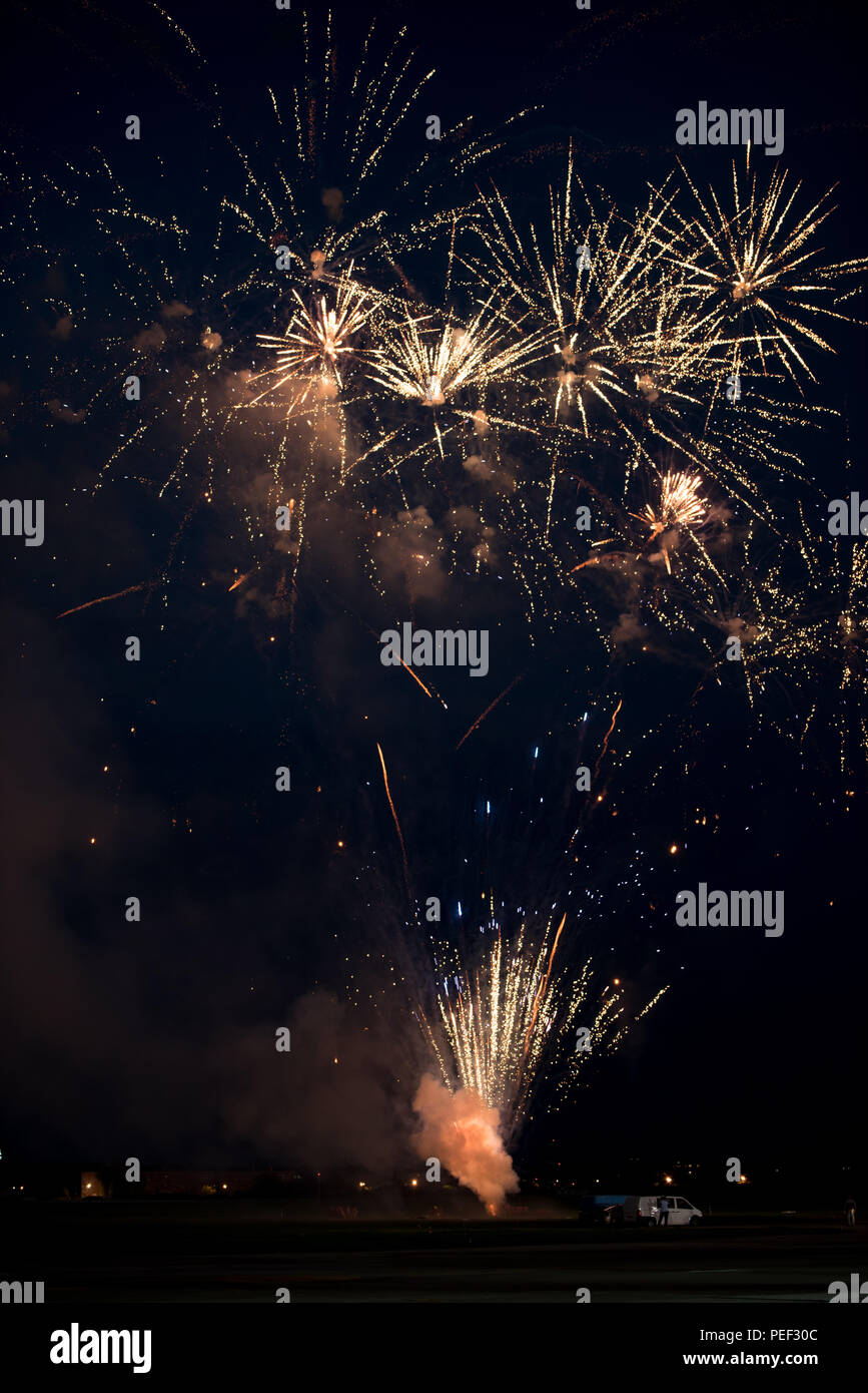 Multiple golden fireworks Stock Photo - Alamy